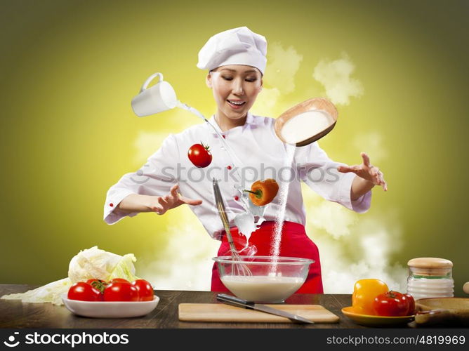 Asian female cooking with magic. Asian female cooking with magic ...