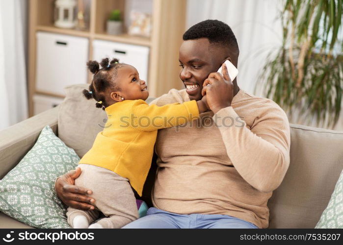 family, fatherhood and technology concept - happy african american ...