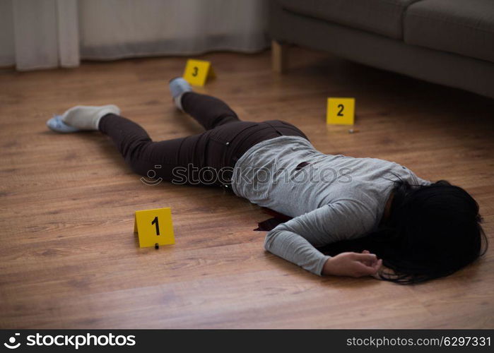 murder, kill and people concept - dead woman body in blood lying on ...