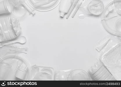 Single-use plastic objects, ecological pollution. Plastic waste. White ...