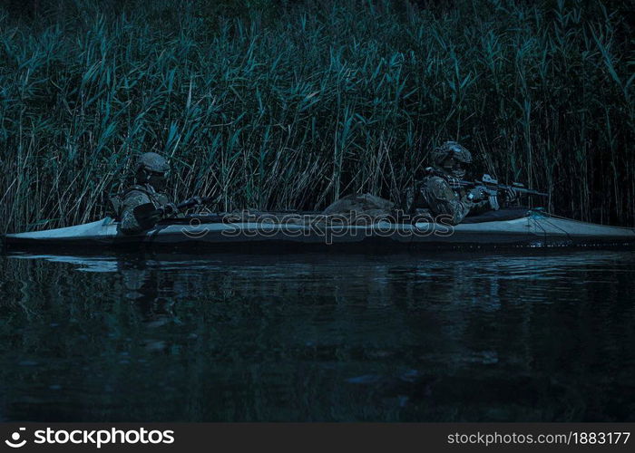 Special forces operators in the military kayak. Spec ops in the ...